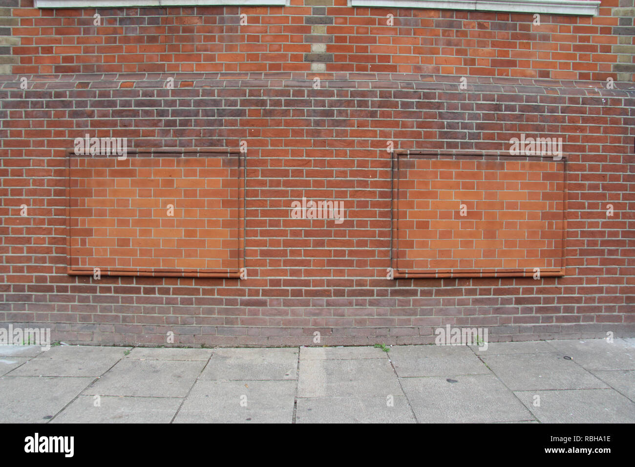 Bricked Up Windows on red brick wall Stock Photo - Alamy