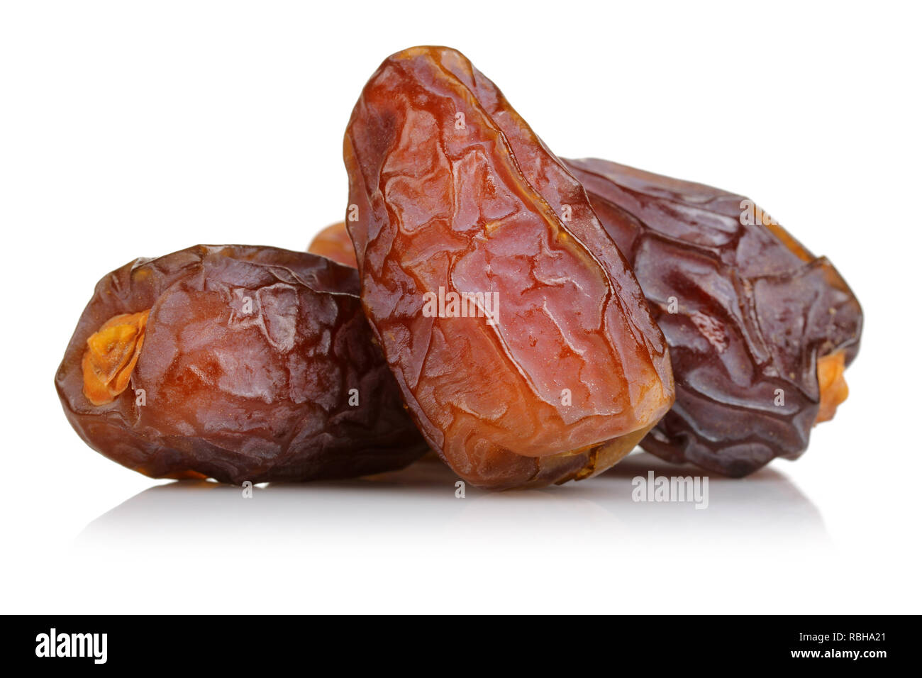 Date fruit isolated on white background. Macro, studio shot Stock Photo ...