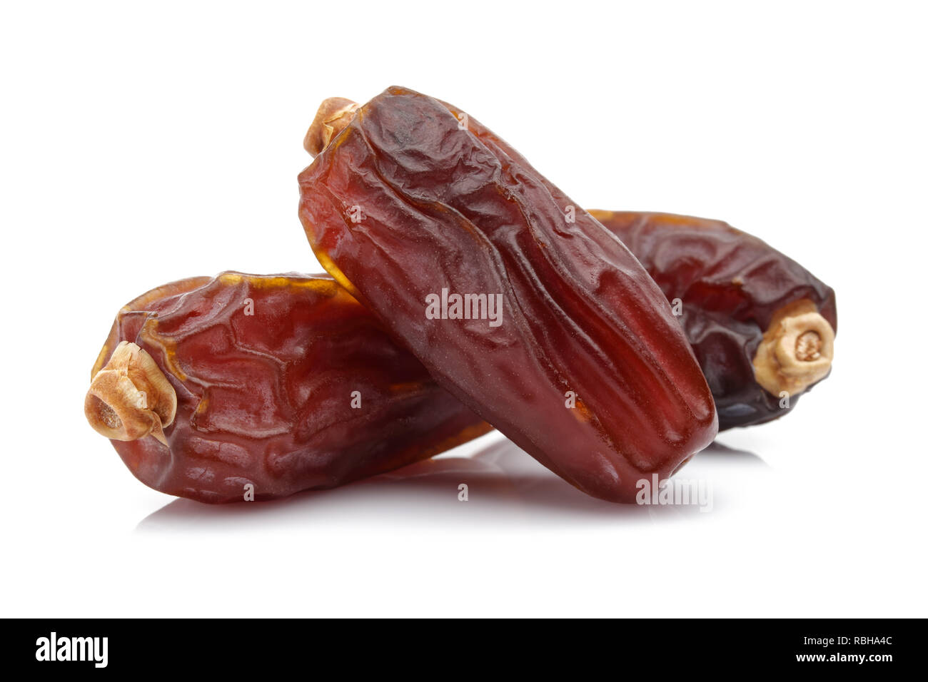 Date fruit isolated on white background. Macro, studio shot Stock Photo ...