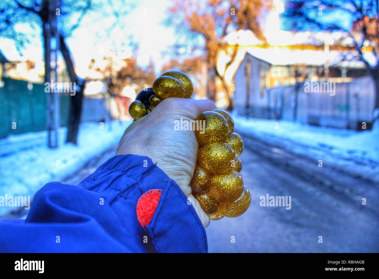 Bubbles squished by hand Stock Photo - Alamy