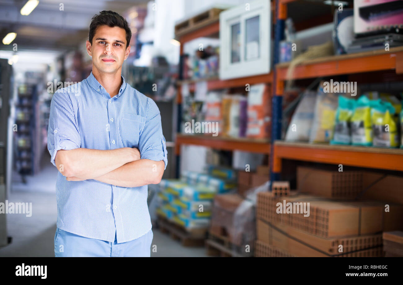 Customer male is satisfied after shopping in building store Stock Photo ...