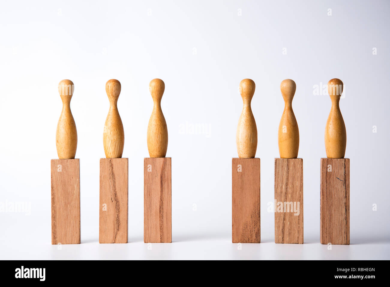 Business leadership concept. Wooden figures on blocks Stock Photo - Alamy