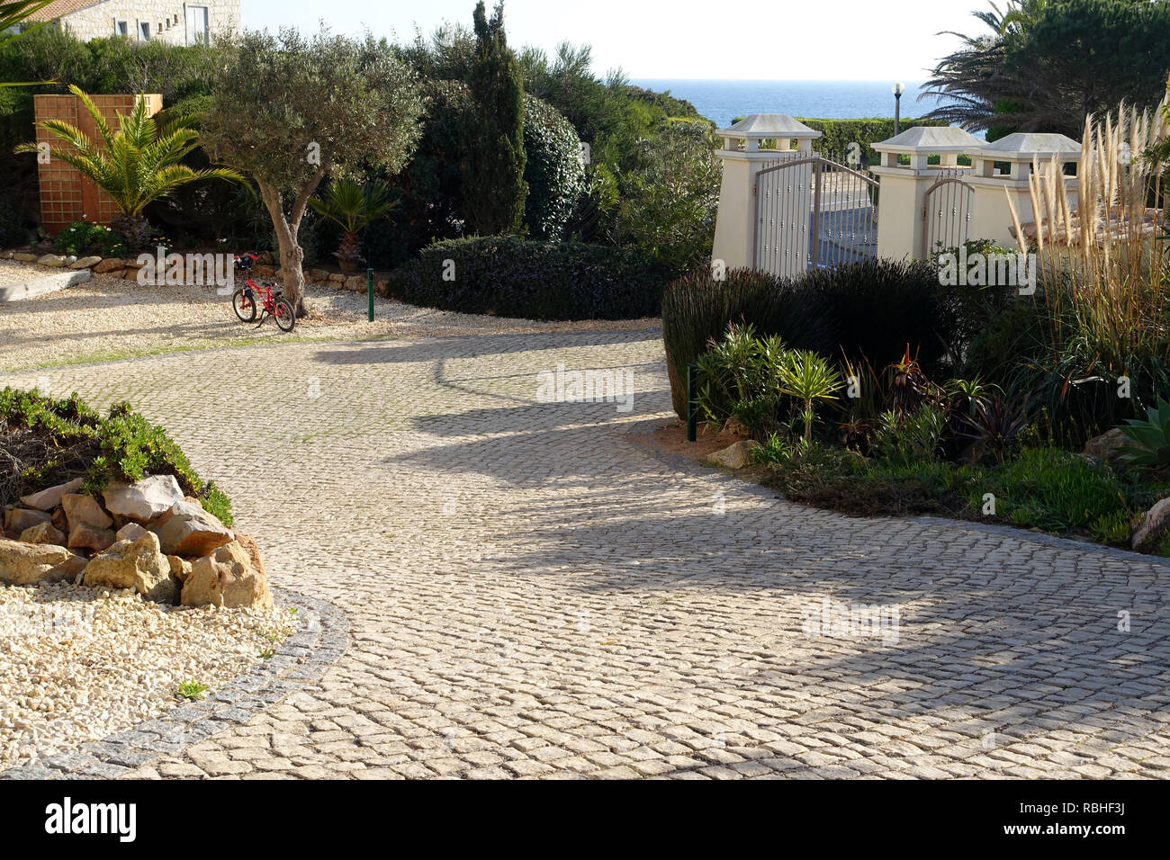 Stone block paved driveway of home Stock Photo - Alamy