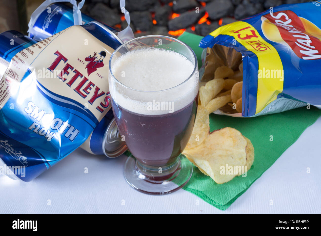 A glass of beer from a can of Tetley's Smooth flow bitter with Cheese ...