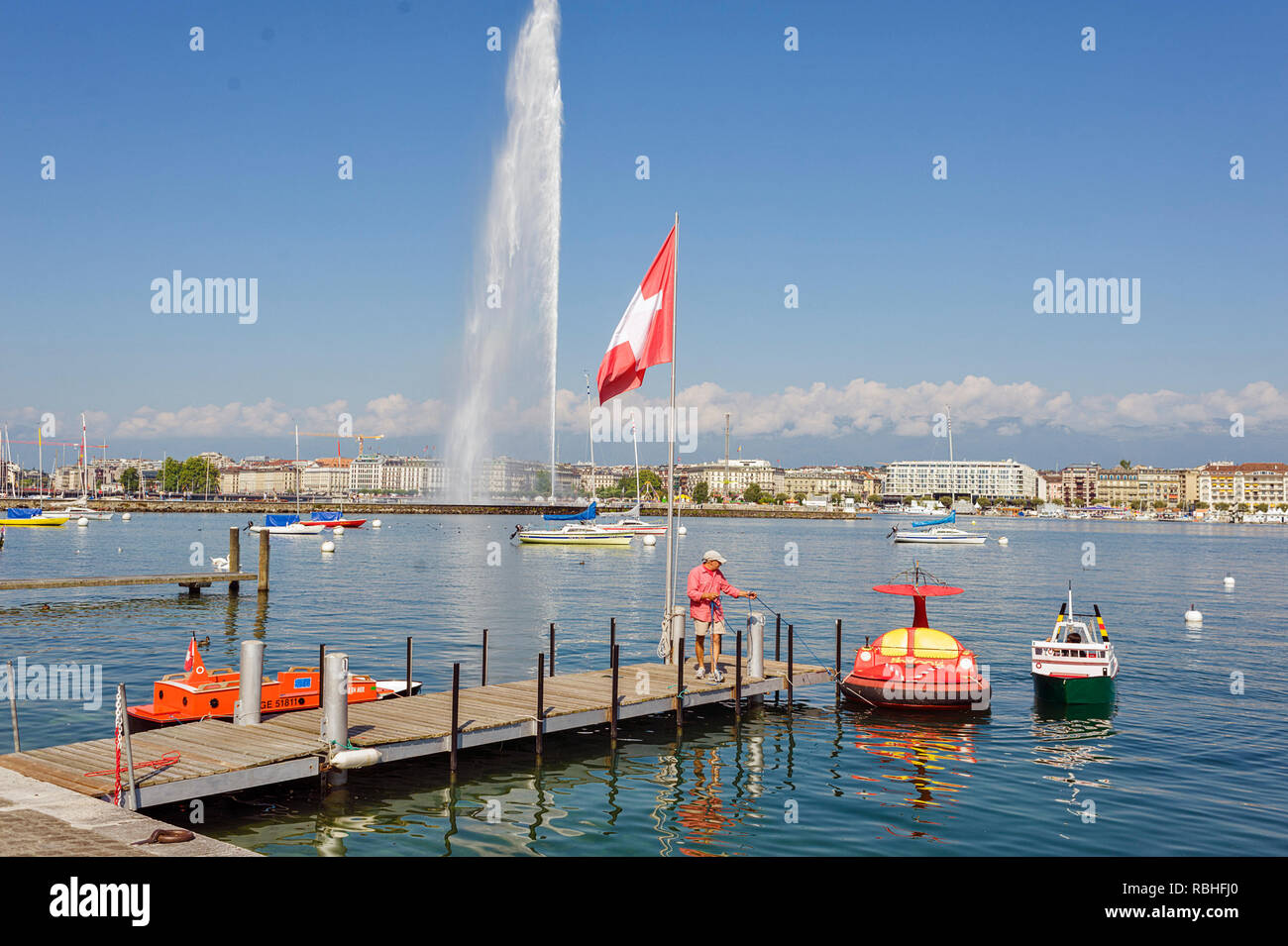 the water jet is the huge Fountain on the Geneva Lake, in the city of ...
