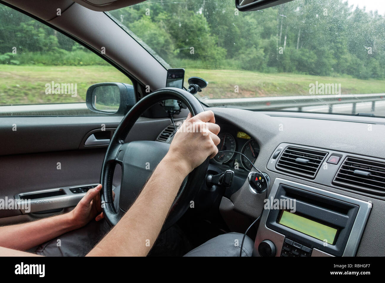 Photo of man behind wheel Stock Photo - Alamy