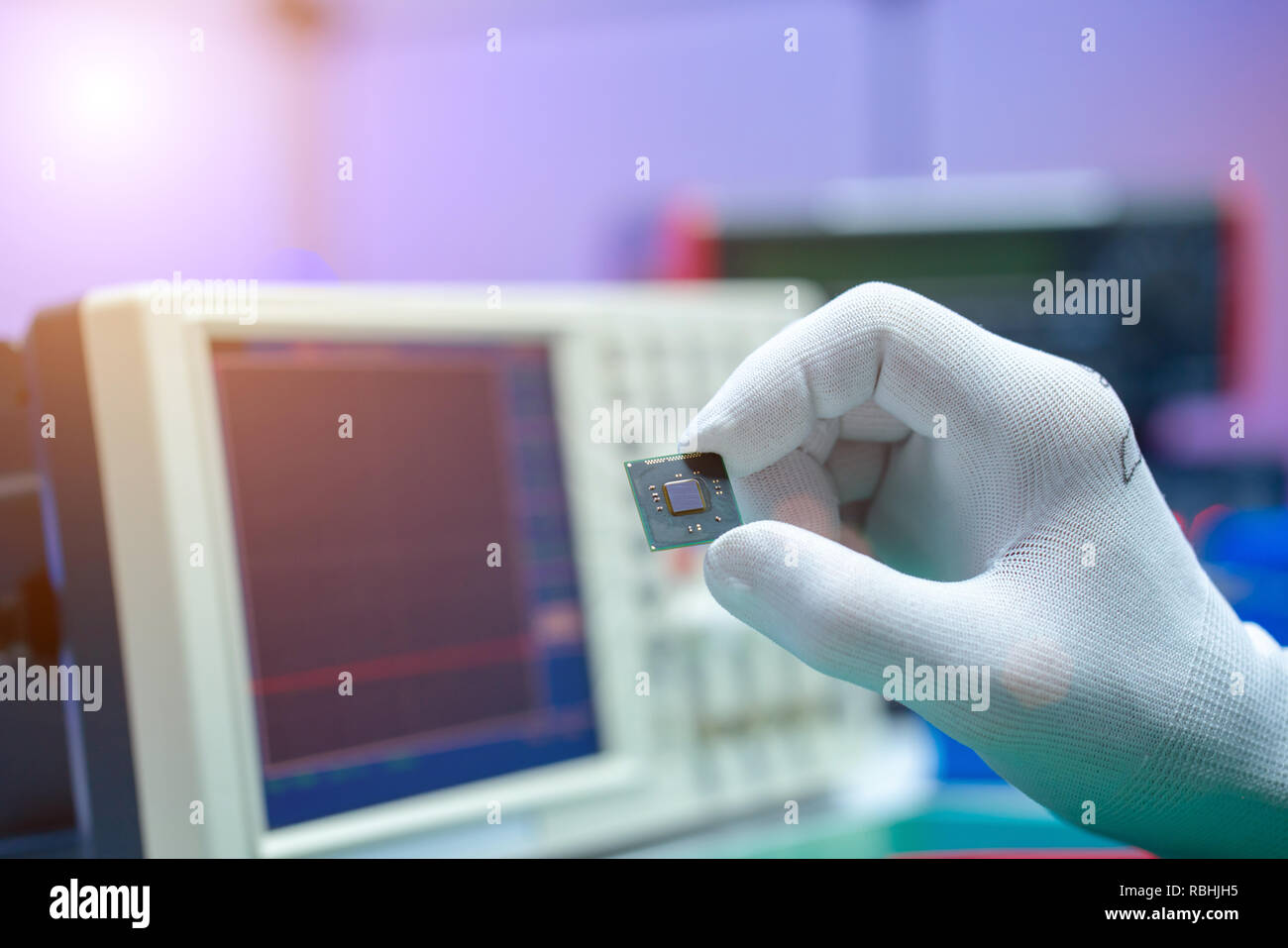 Hand with small electronic microchip microcontroller Stock Photo - Alamy