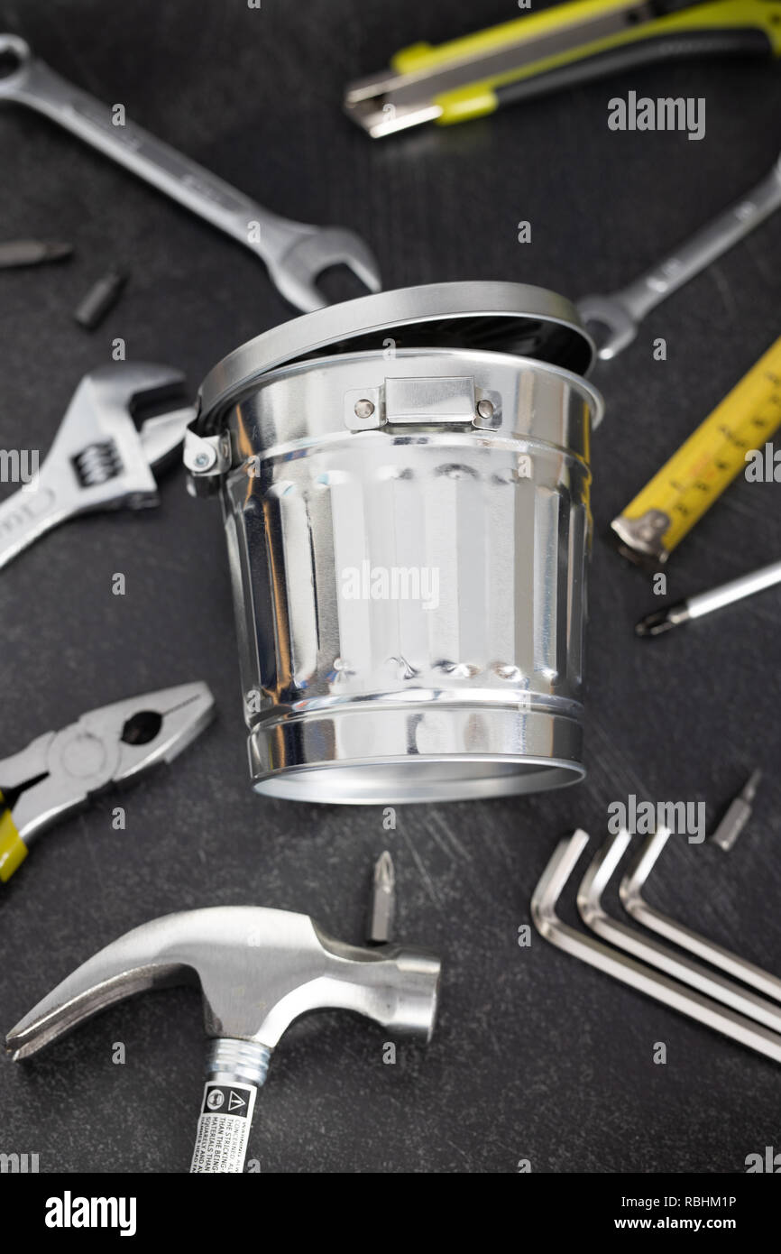 decluttering and home renovation concept: set of DIY tools and garbage ...