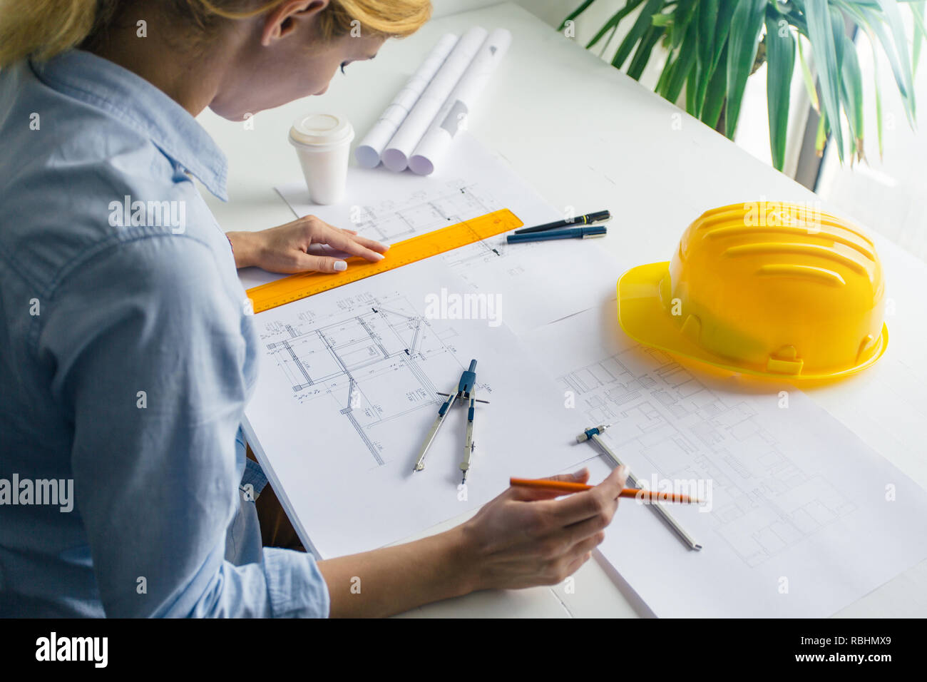 Construction blueprint project working hi-res stock photography and ...