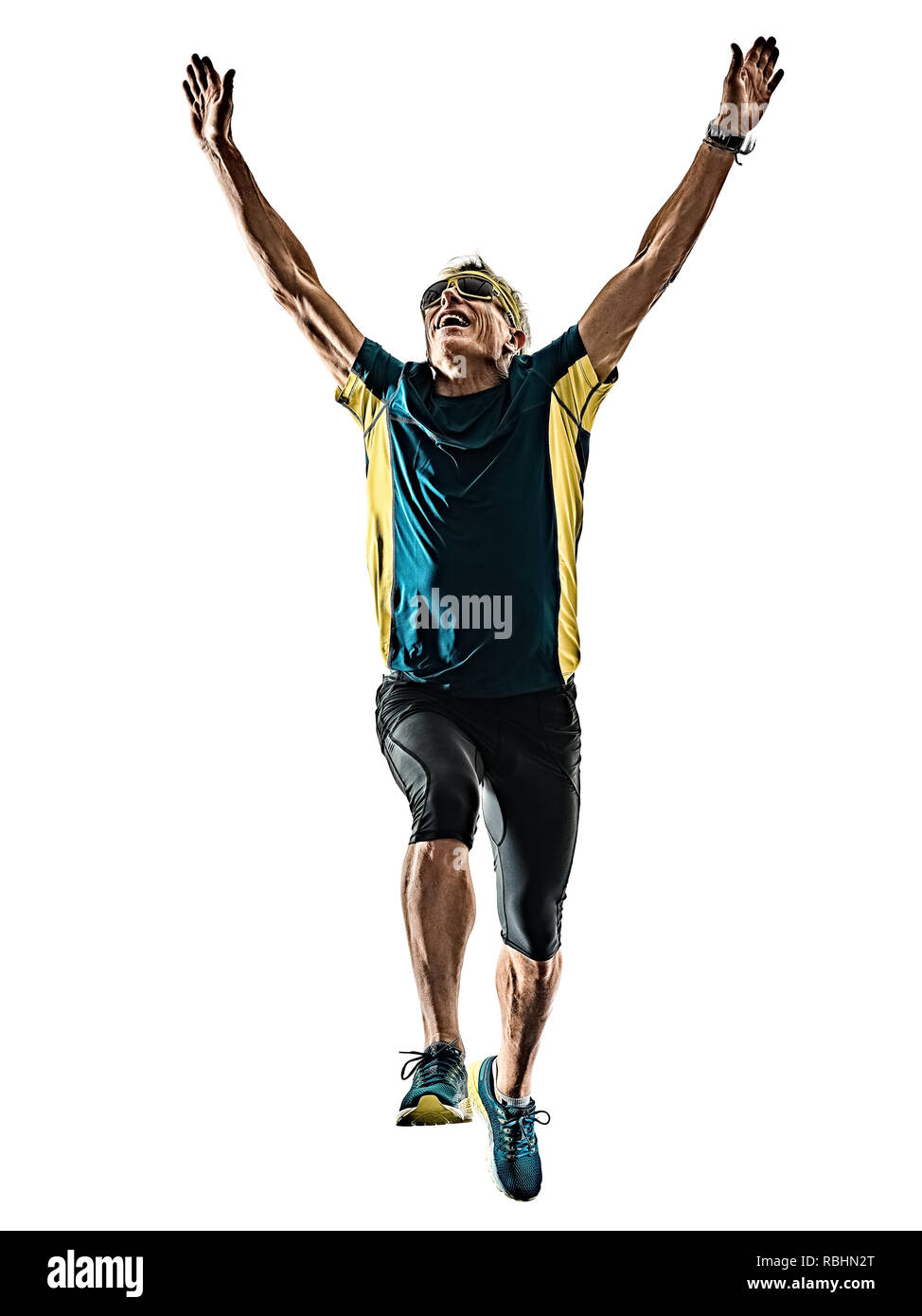 one caucasian senior man running runner jogger jogging in studio shadow ...