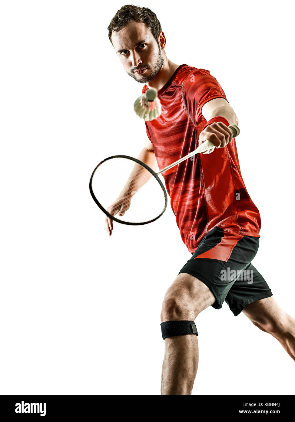 one caucasian Badminton player man in studio shadow silhouette isolated ...