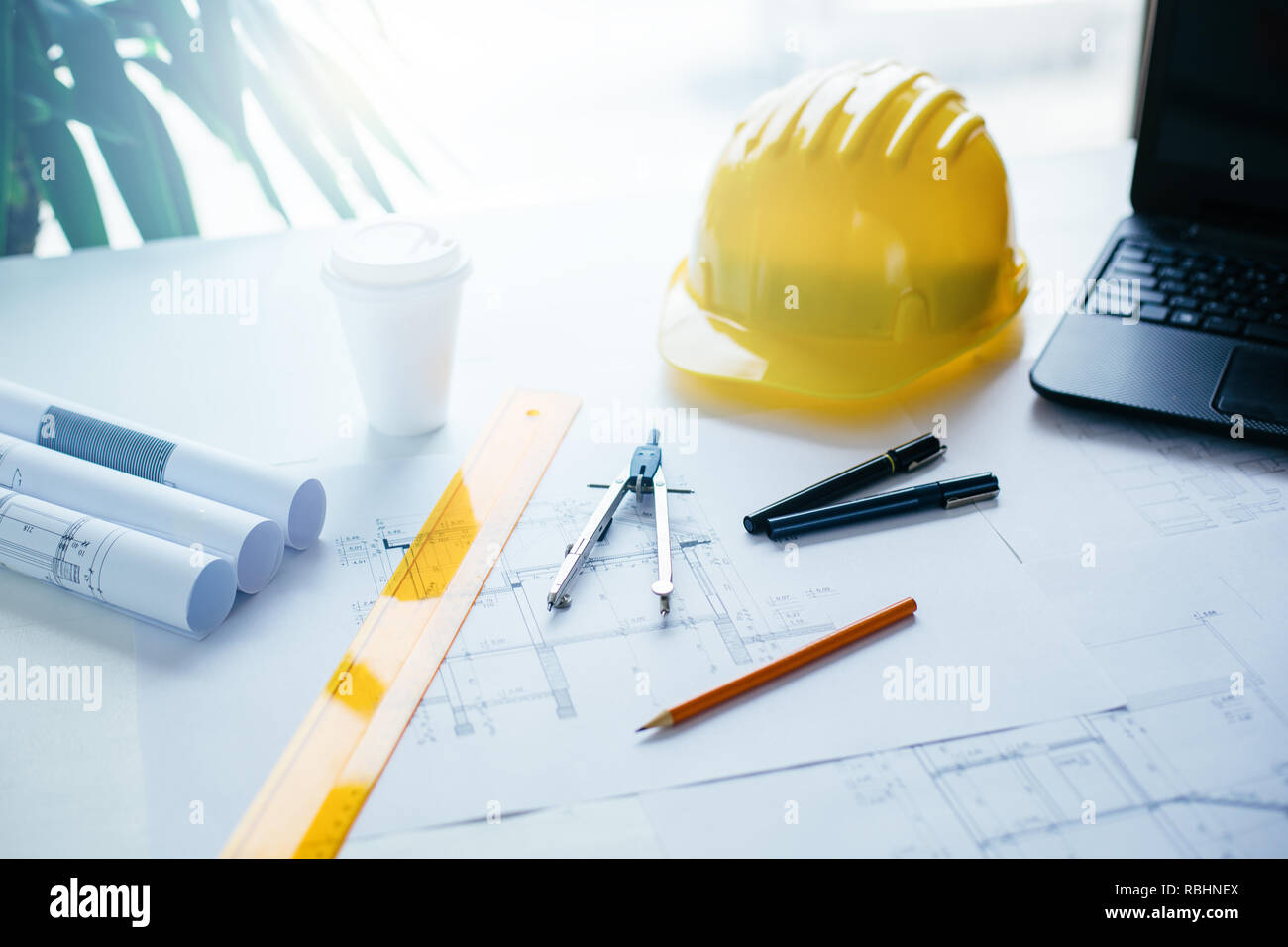 Engineers equipment and blueprints on the office desk. Construction ...
