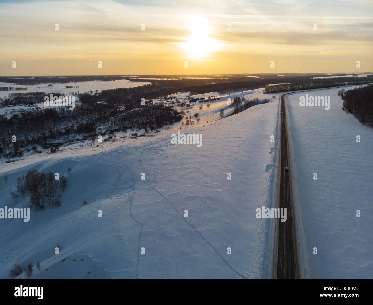 Aerial flying over snowy forest hi-res stock photography and images - Alamy