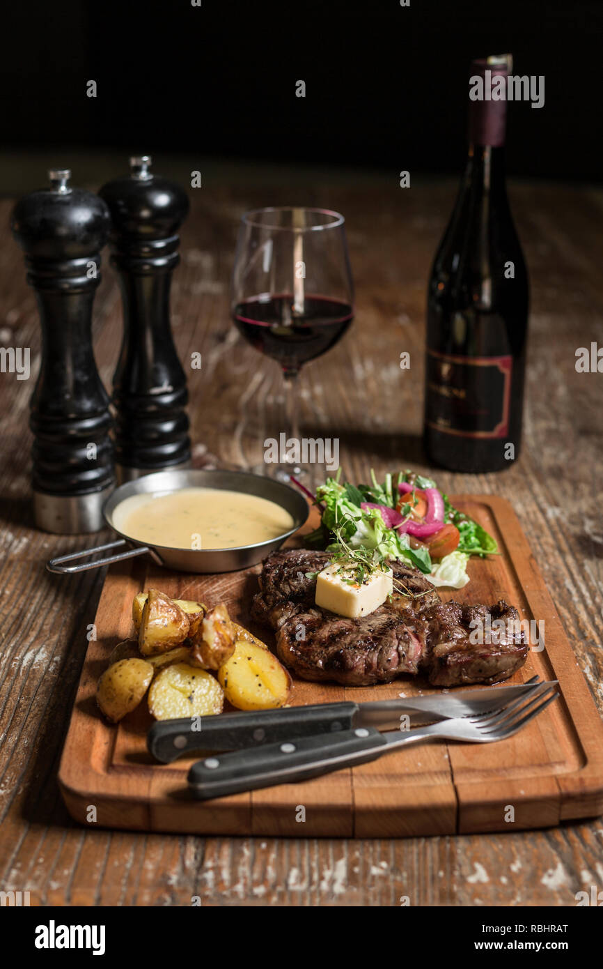 Delicious and juicy roasted meat, prepared in a fancy restaurant by a ...