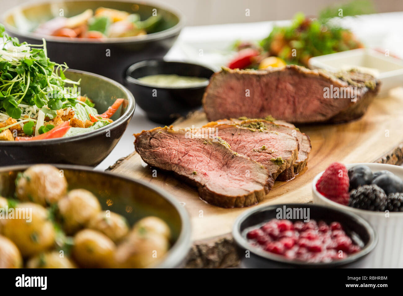 Delicious and juicy roasted meat, prepared in a fancy restaurant by a ...