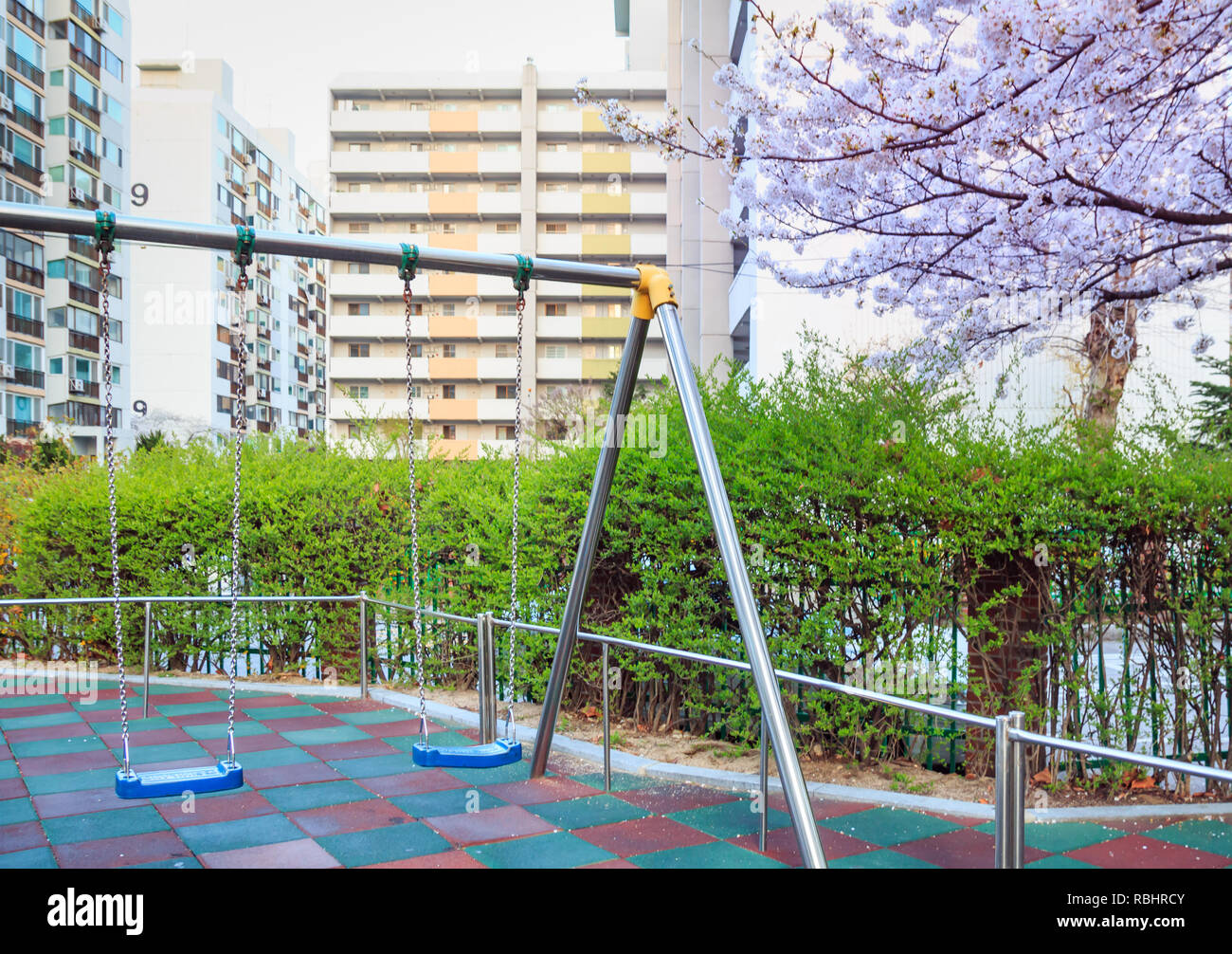 Pink swings hi-res stock photography and images - Alamy