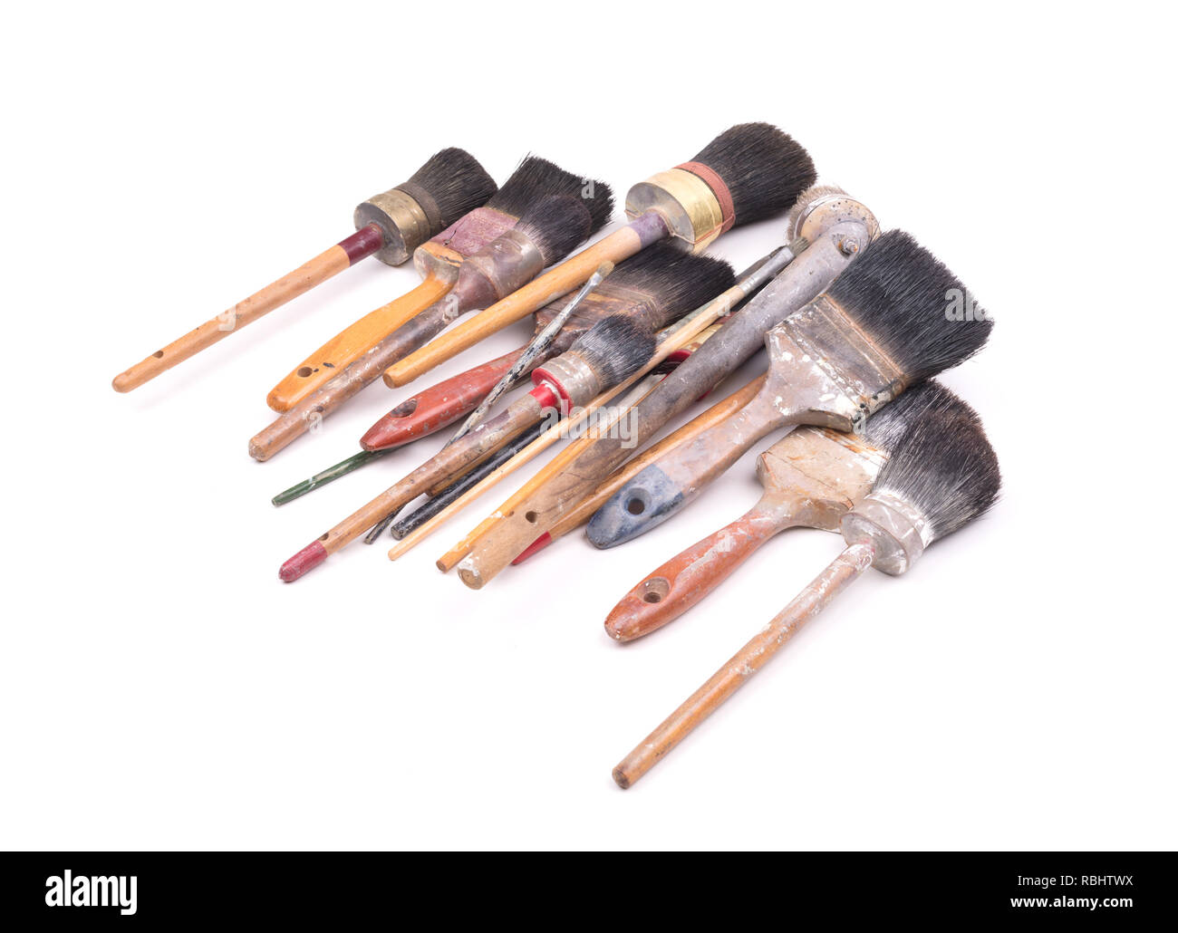 Old and used paint brushes, on white background Stock Photo - Alamy