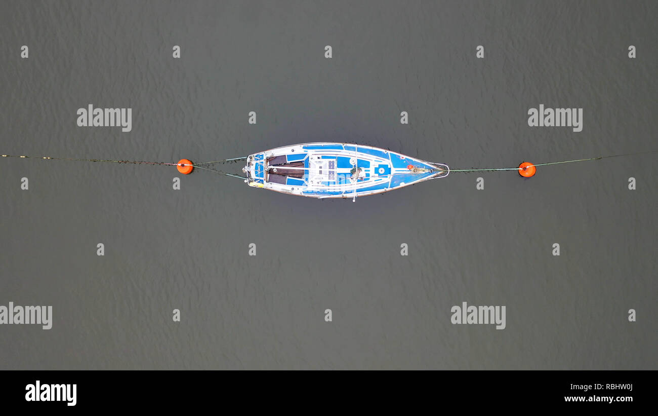Aerial view of a sailing boat in a marina Stock Photo - Alamy