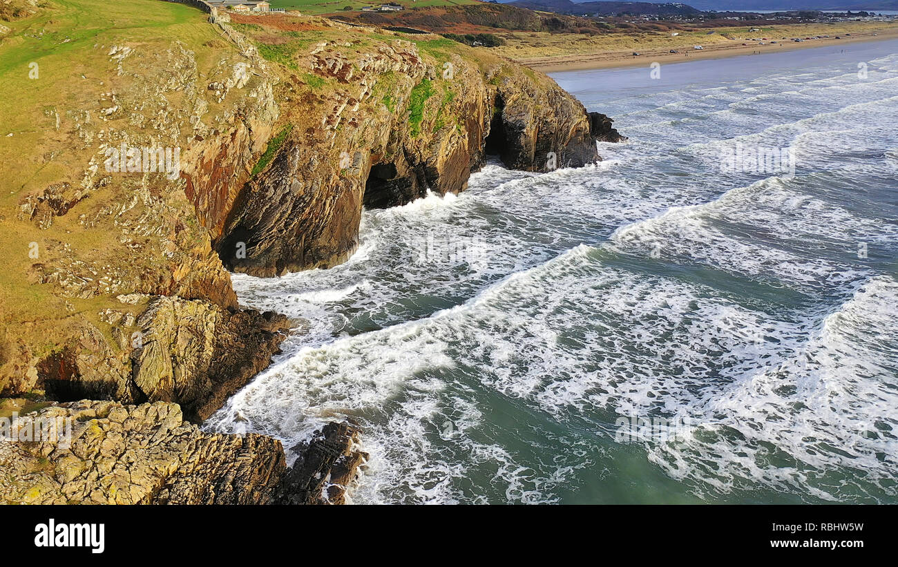 Aerial view of cliffs and ocean at Black Rock sands in Gwynedd, North ...