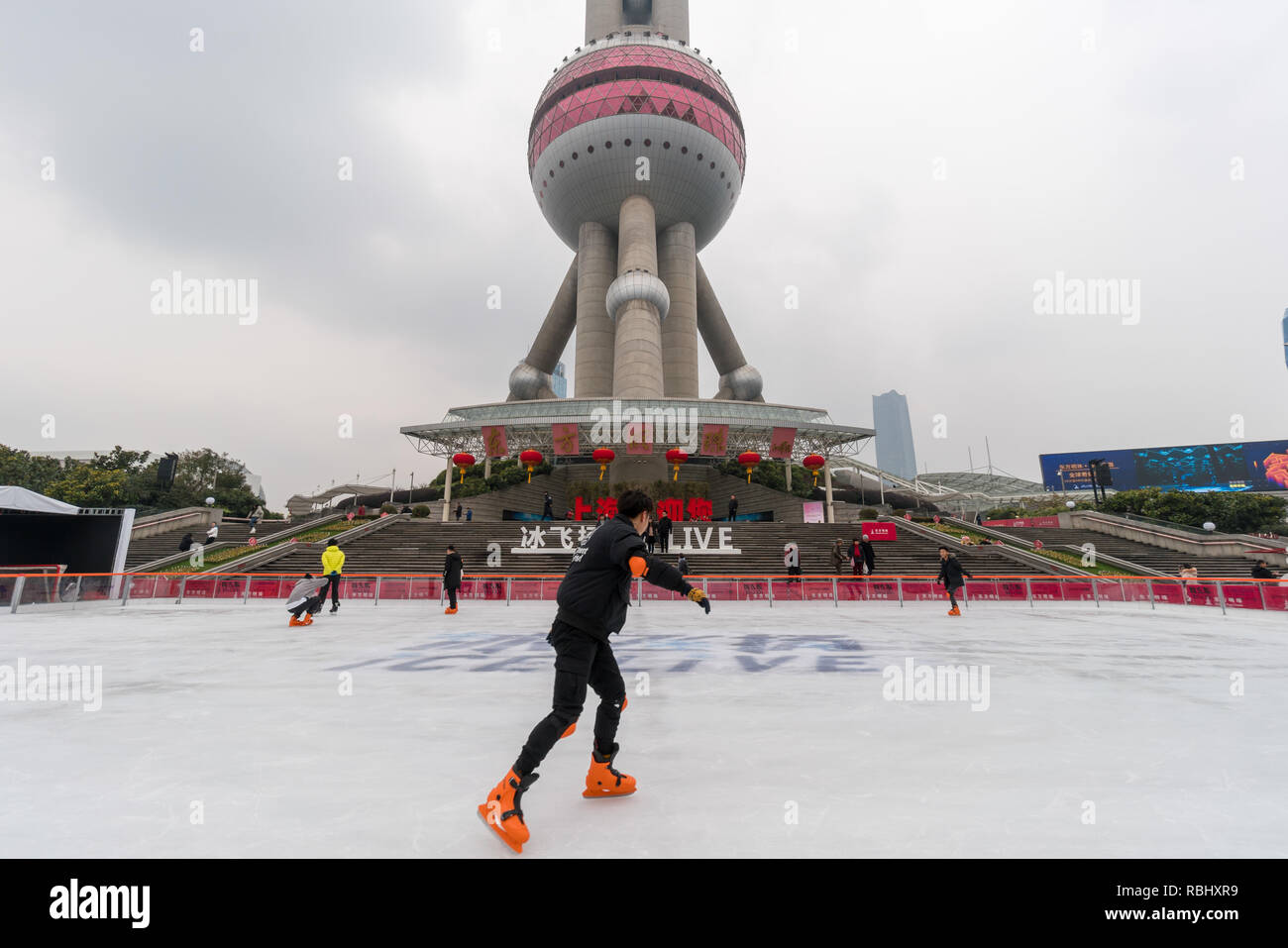 Shanghai, China. 10th Jan, 2019. People enjoy skating at the ice rink ...