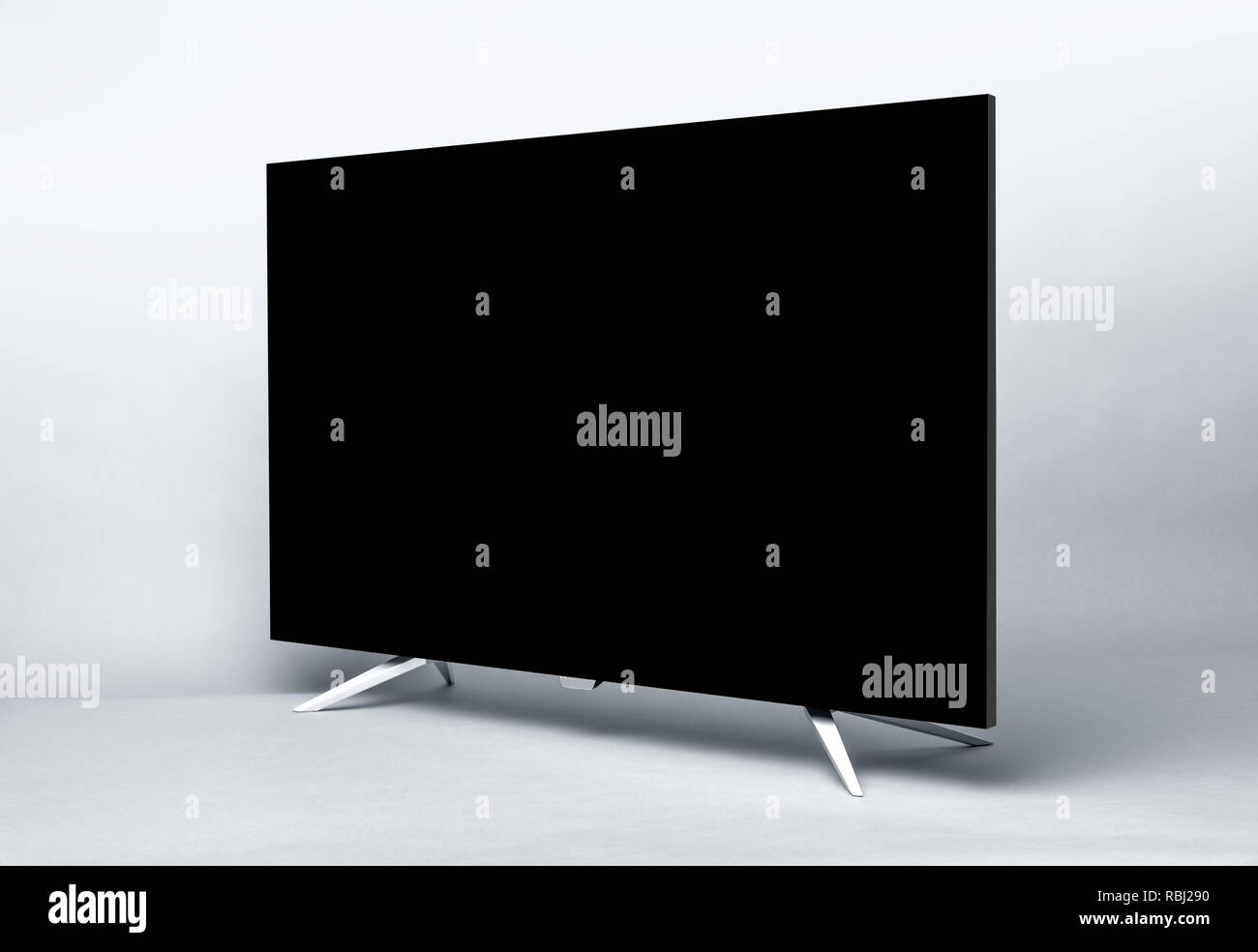 Modern TV or PC monitor on gray background Stock Photo - Alamy