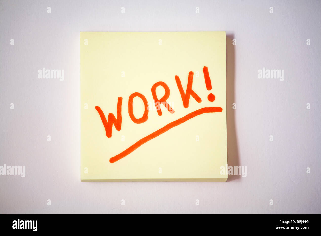 Yellow sticky notes - Work! Stock Photo - Alamy