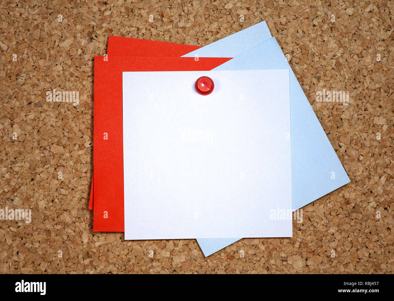 Reminder cards on pin board Stock Photo - Alamy