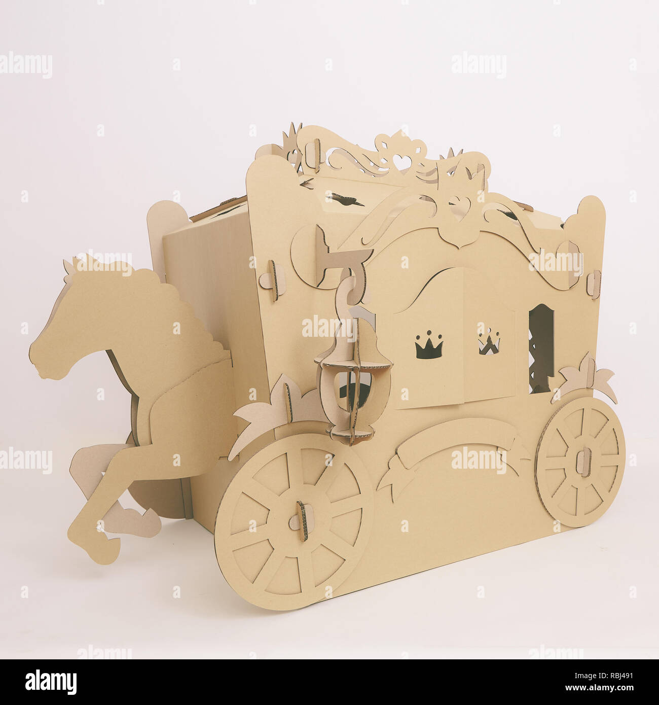 The fairy tale carriage from cardboad. Retro filter Stock Photo - Alamy