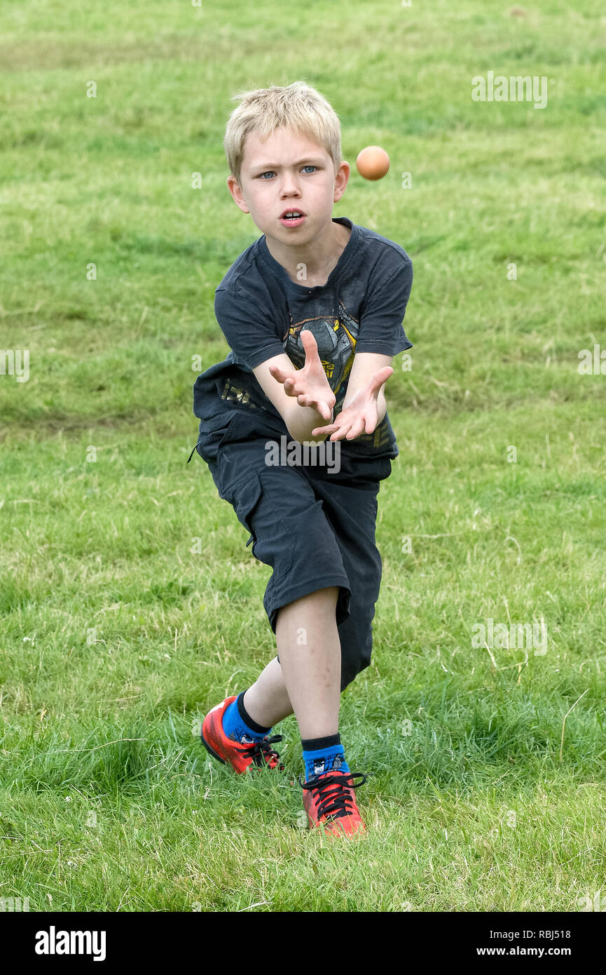 Participant Attempting To Catch A Raw Egg At The World Egg Throwing ...