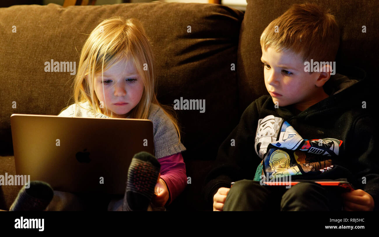 Little girl using computer hi-res stock photography and images - Alamy