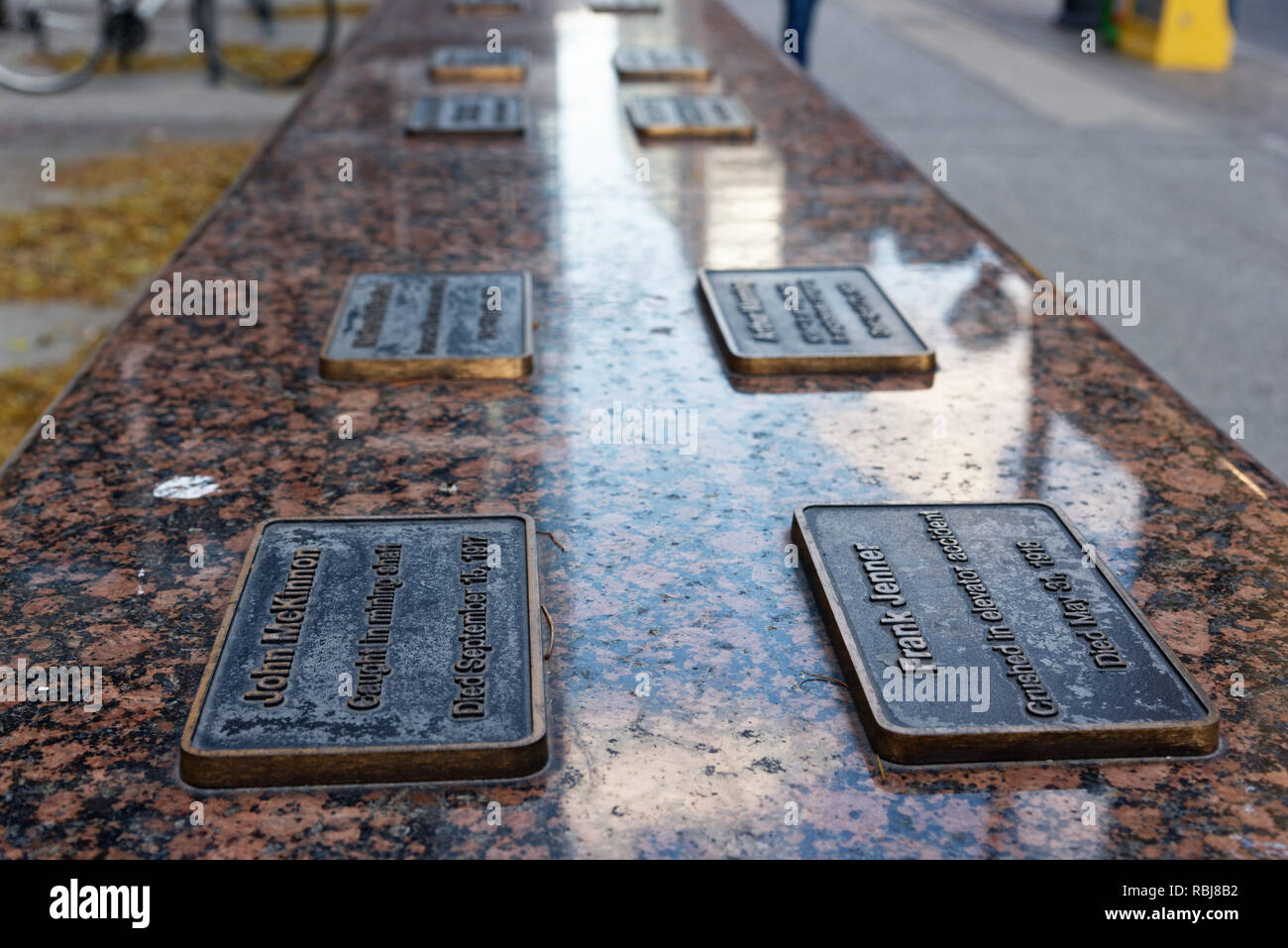 The 100 Workers memorial on Front Street, Toronto Stock Photo - Alamy