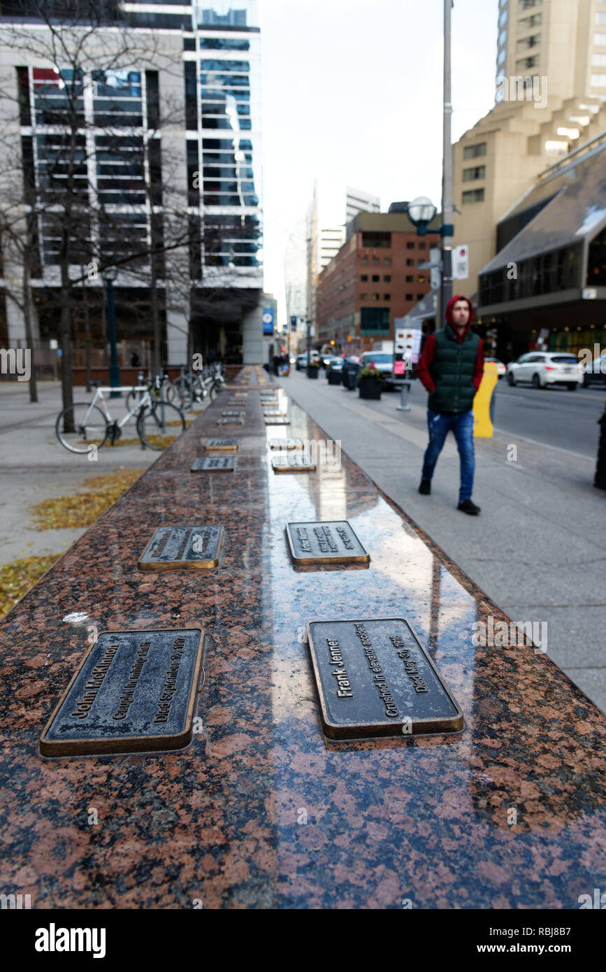 The 100 Workers memorial on Front Street, Toronto Stock Photo - Alamy