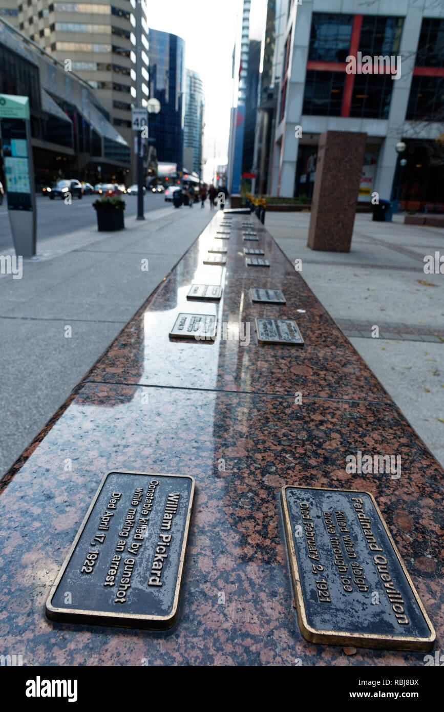 The 100 Workers memorial on Front Street, Toronto Stock Photo - Alamy