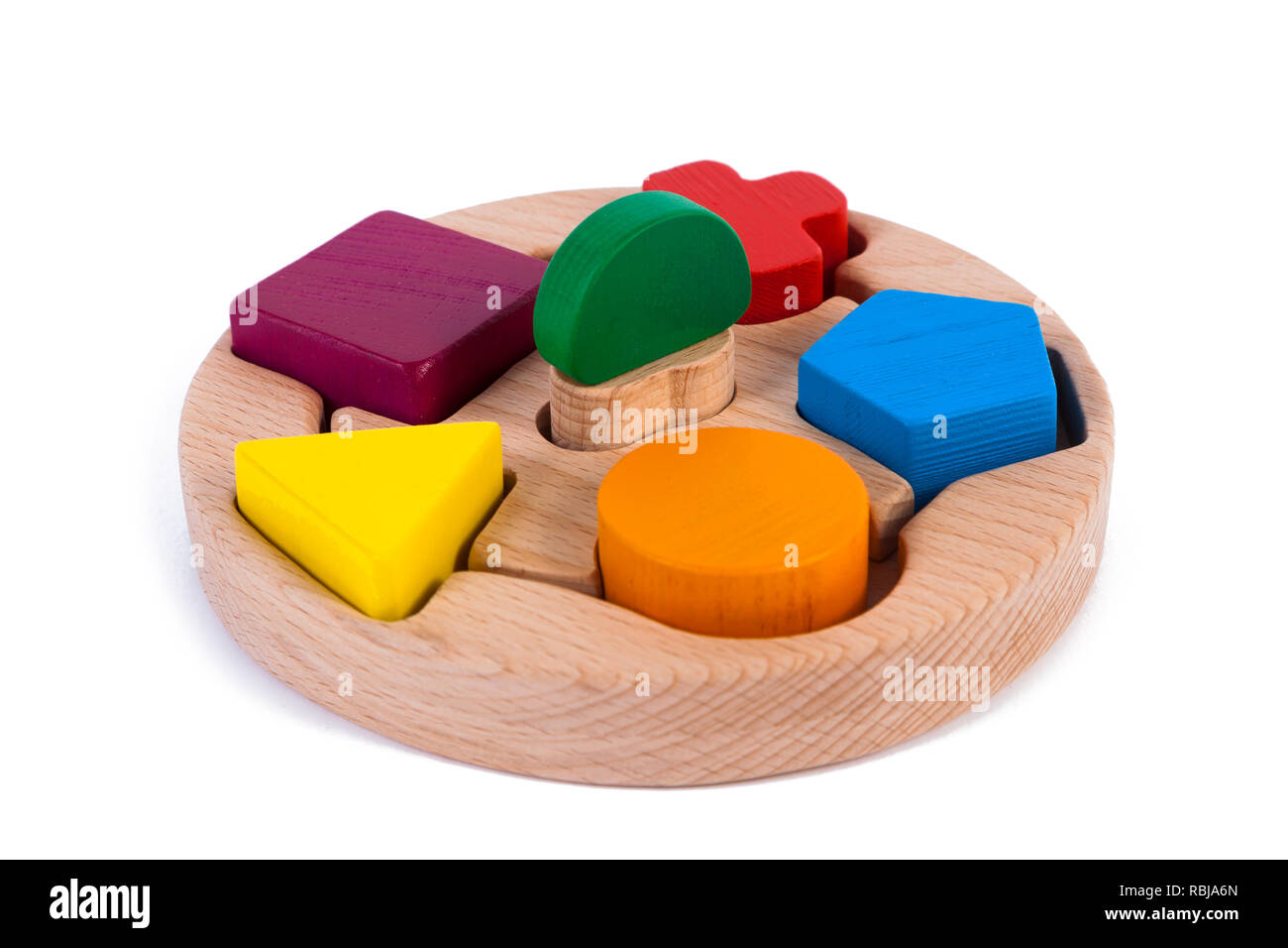 Photo of a wooden toy children's sorter with small wooden details in ...