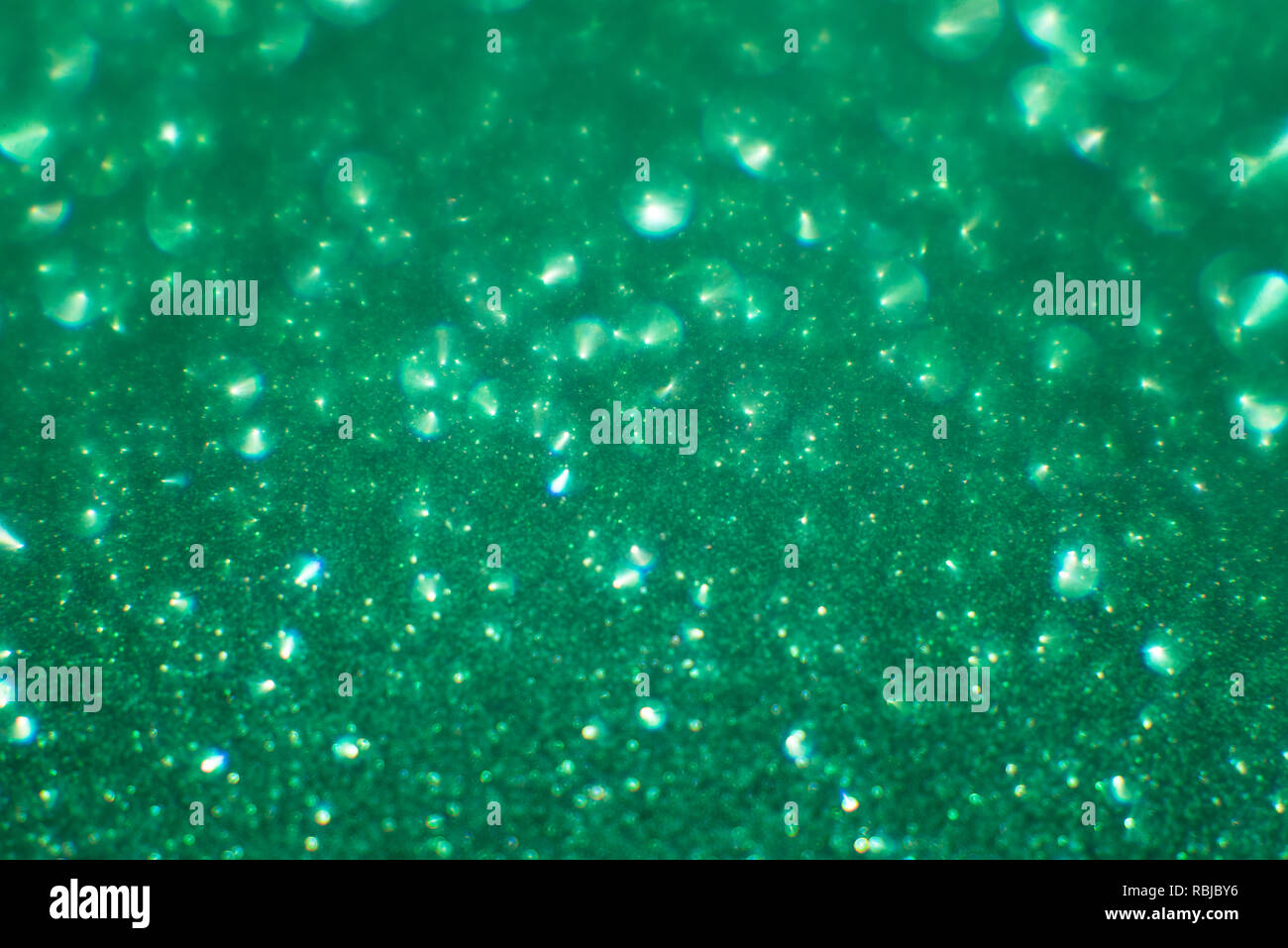 Green glitter with bokeh Stock Photo - Alamy