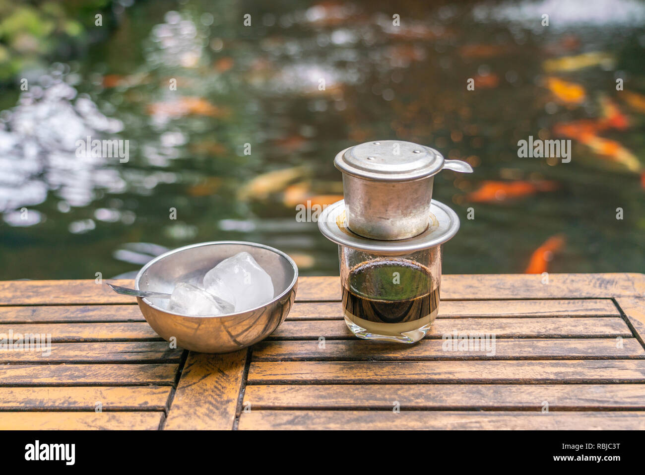 Traditional Vietnam coffee with the Fish tank background Stock Photo ...