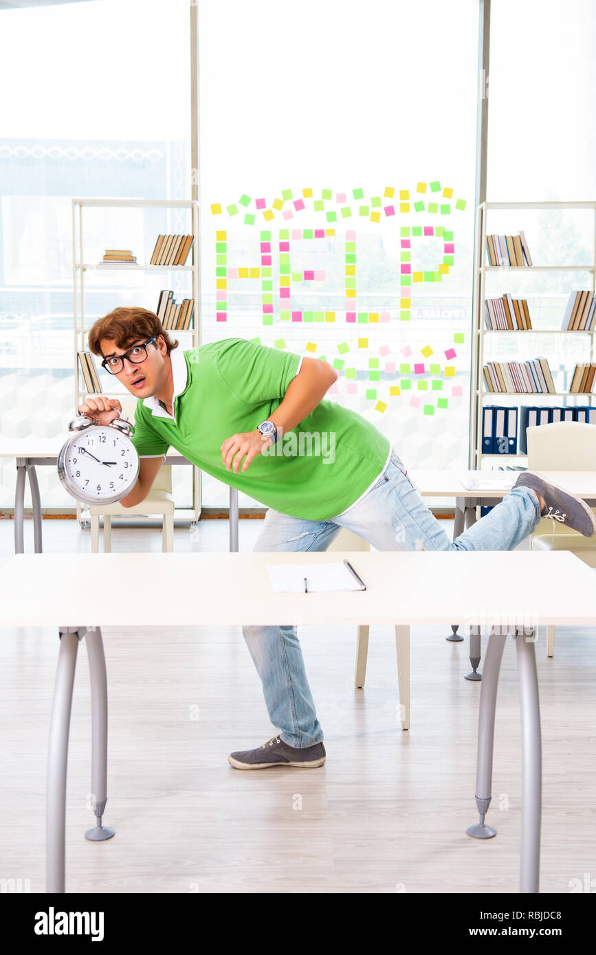 Student struggling at the exam in classroom Stock Photo - Alamy