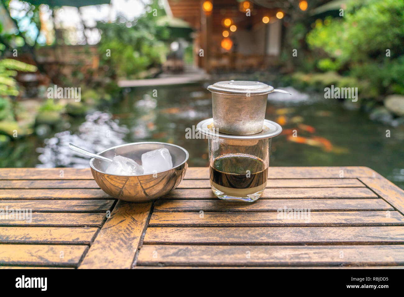Hot milk coffee dripping in Vietnam style Stock Photo - Alamy