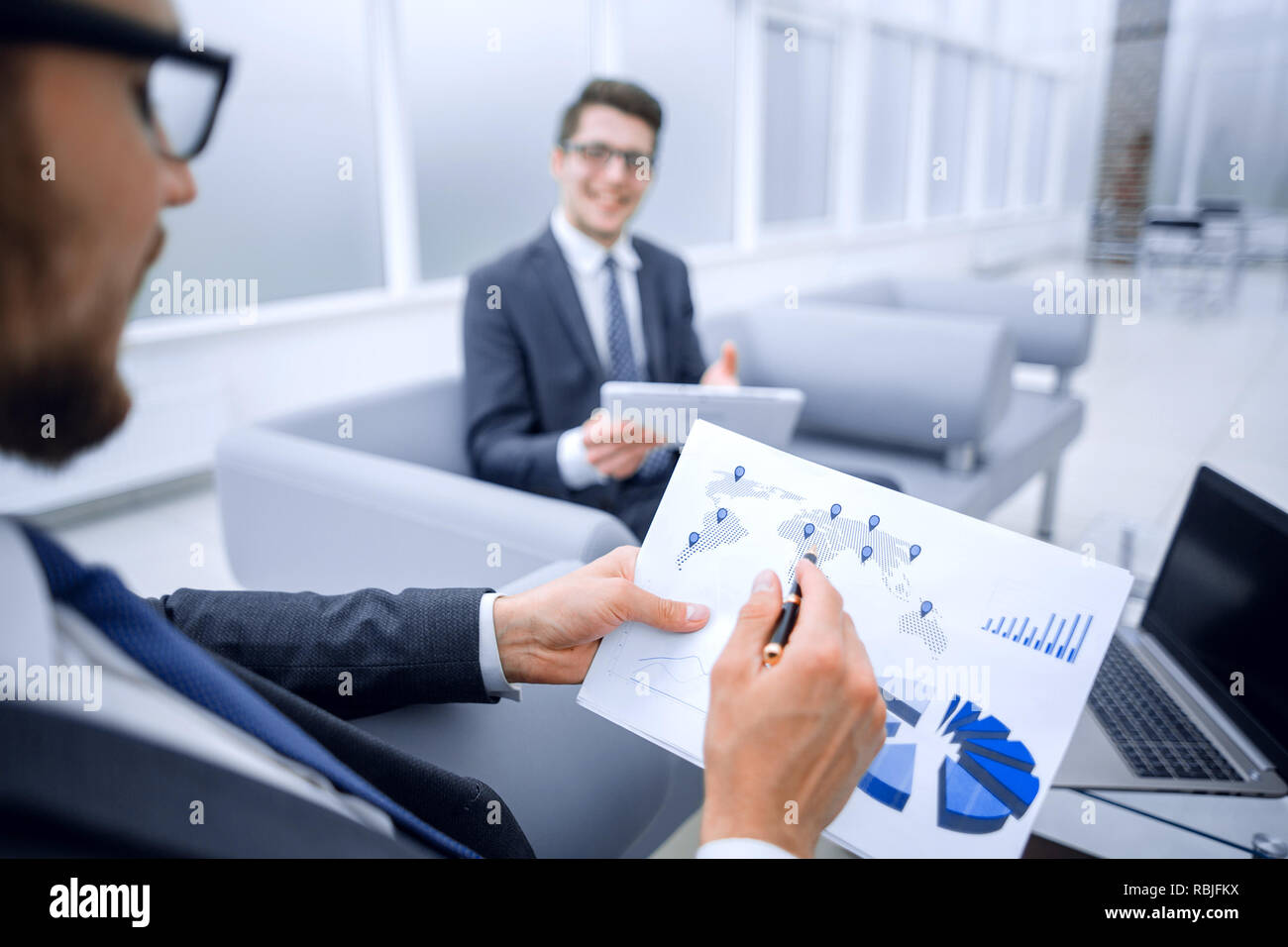 close up.employees analyze statistical data Stock Photo - Alamy