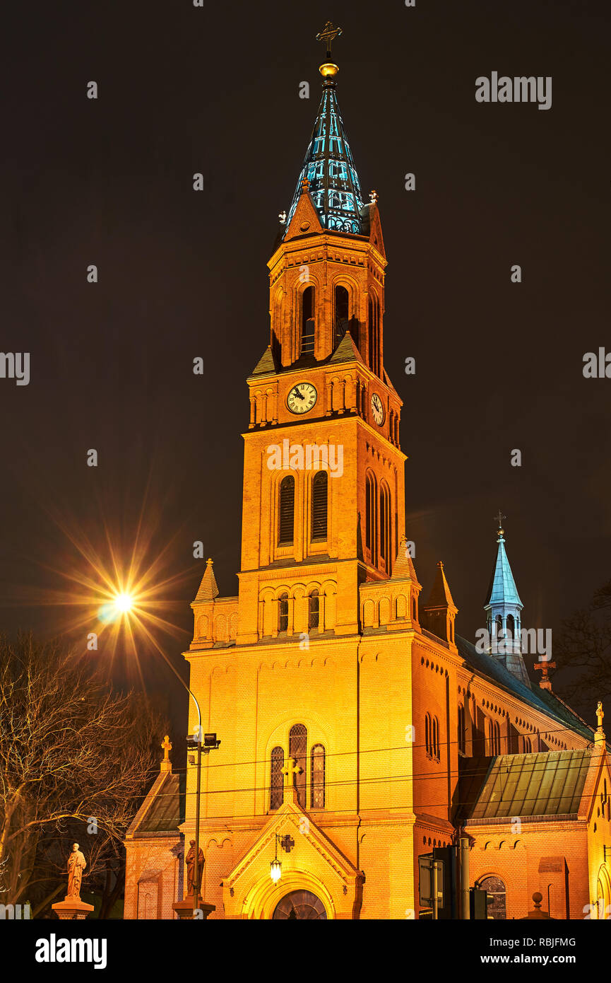 neo-Gothic brick Catholic church at night in Poznan Stock Photo - Alamy