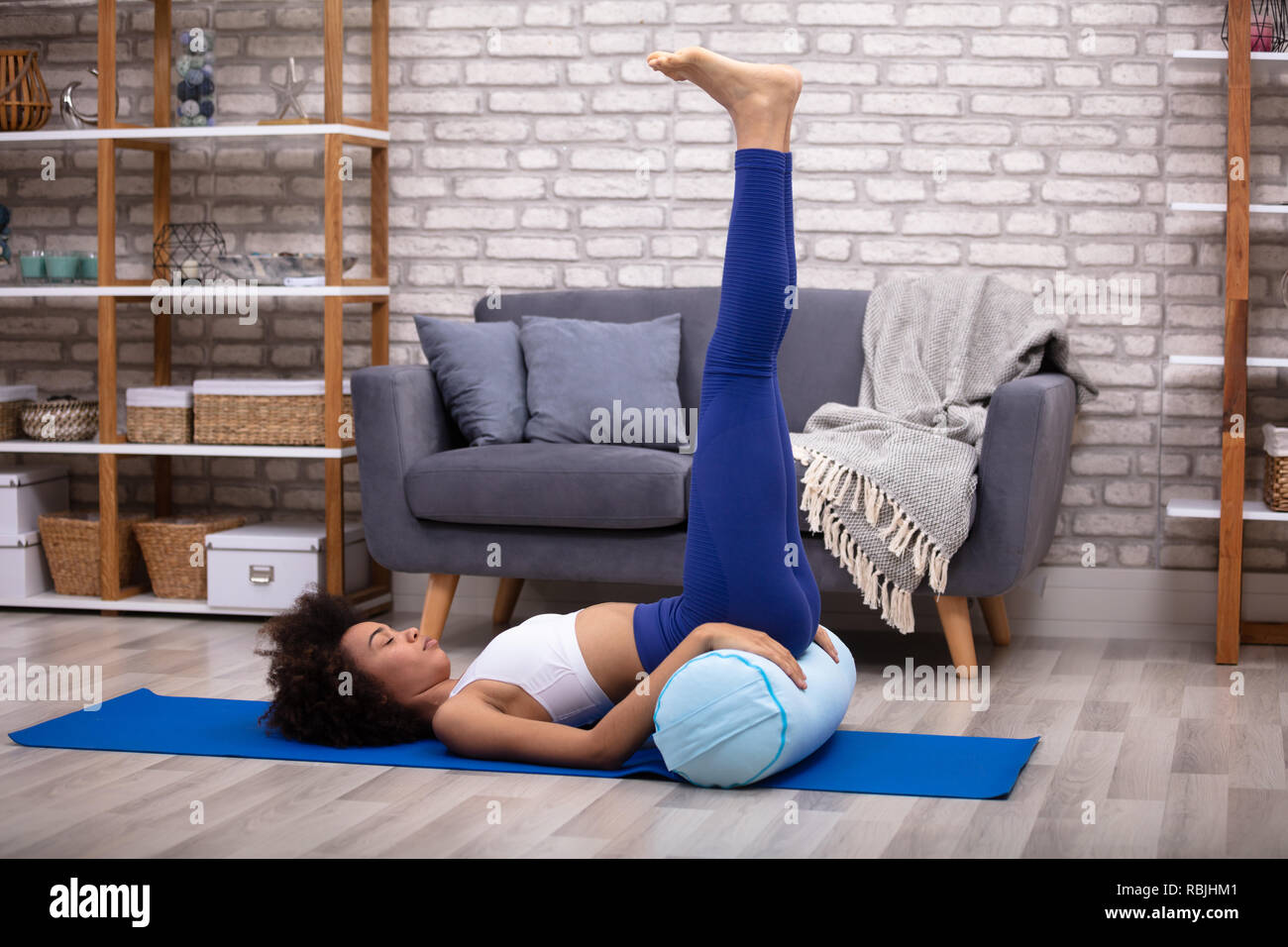Woman lying back legs up hi-res stock photography and images - Alamy