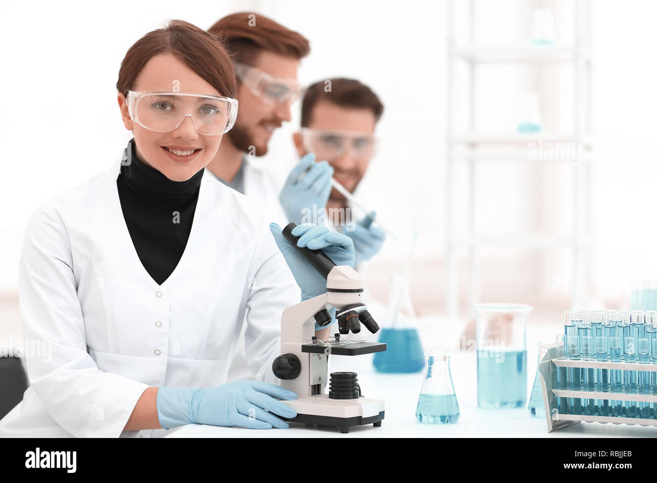 female scientist in a laboratory Stock Photo - Alamy