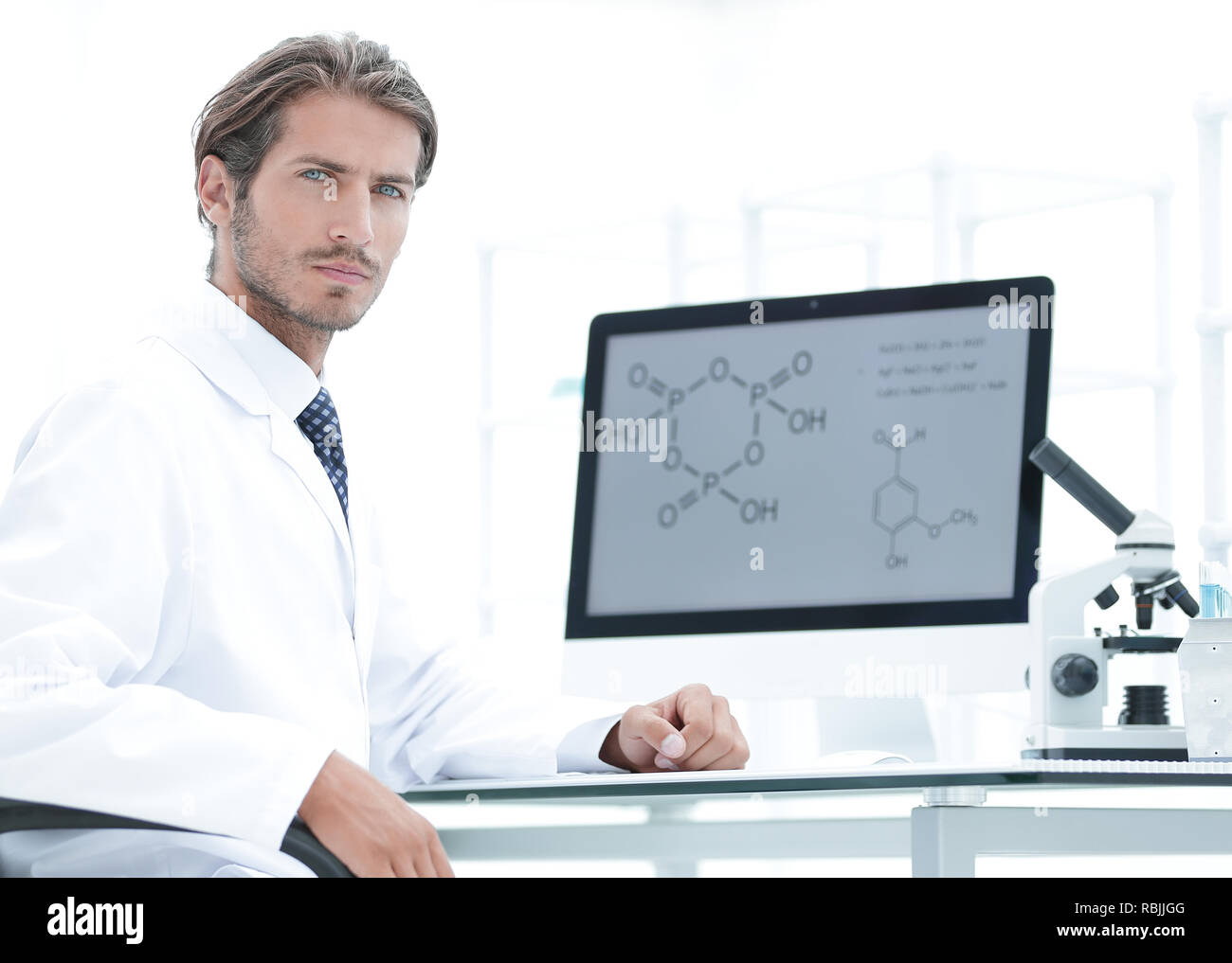 Medical doctor working with microscope in laboratory Stock Photo - Alamy