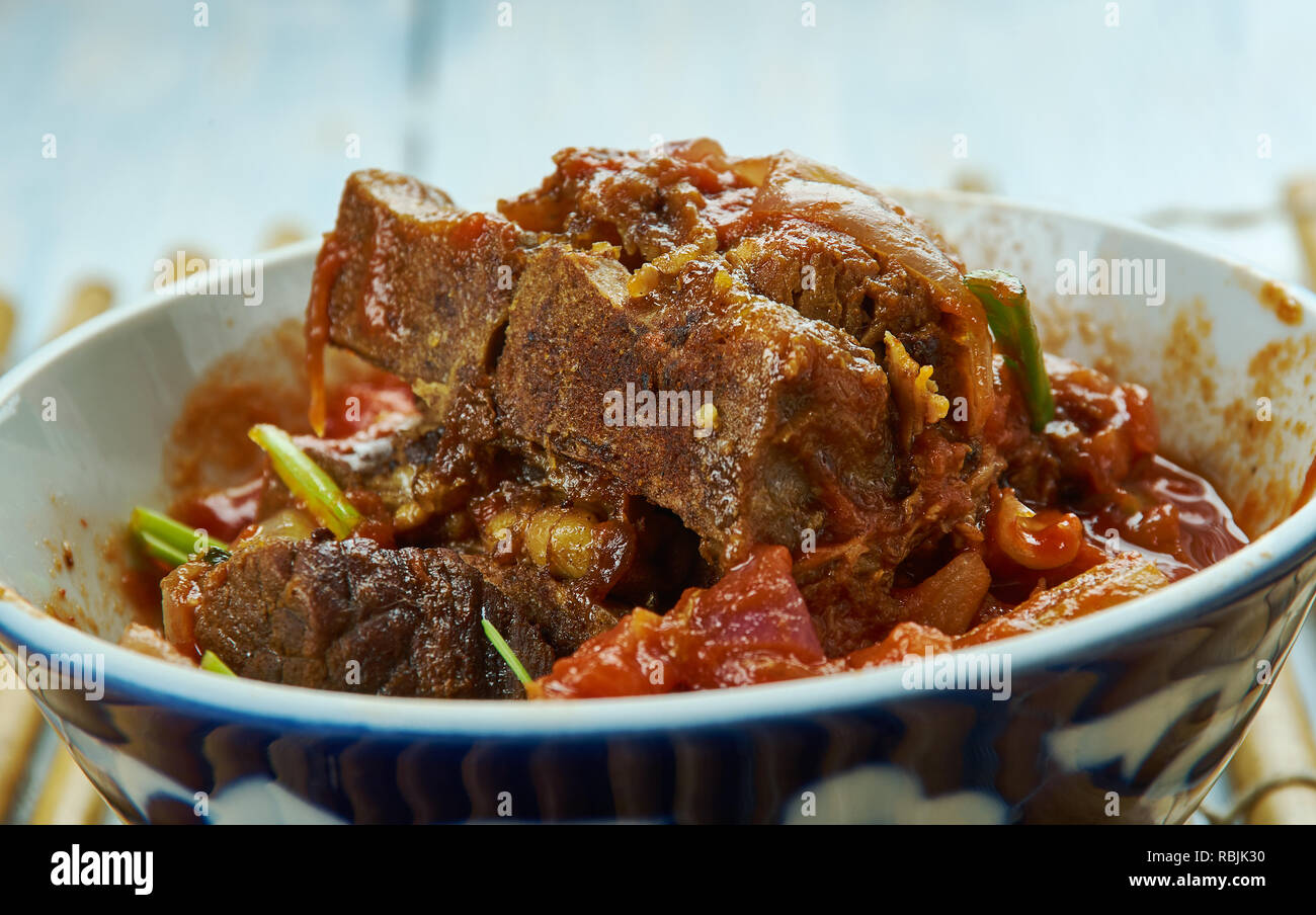 Rampuri korma, Rampuri cuisine, Mutton legs cooked in thick gravy Stock ...