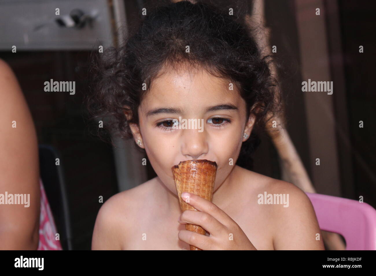 girl eating ice cream Stock Photo - Alamy