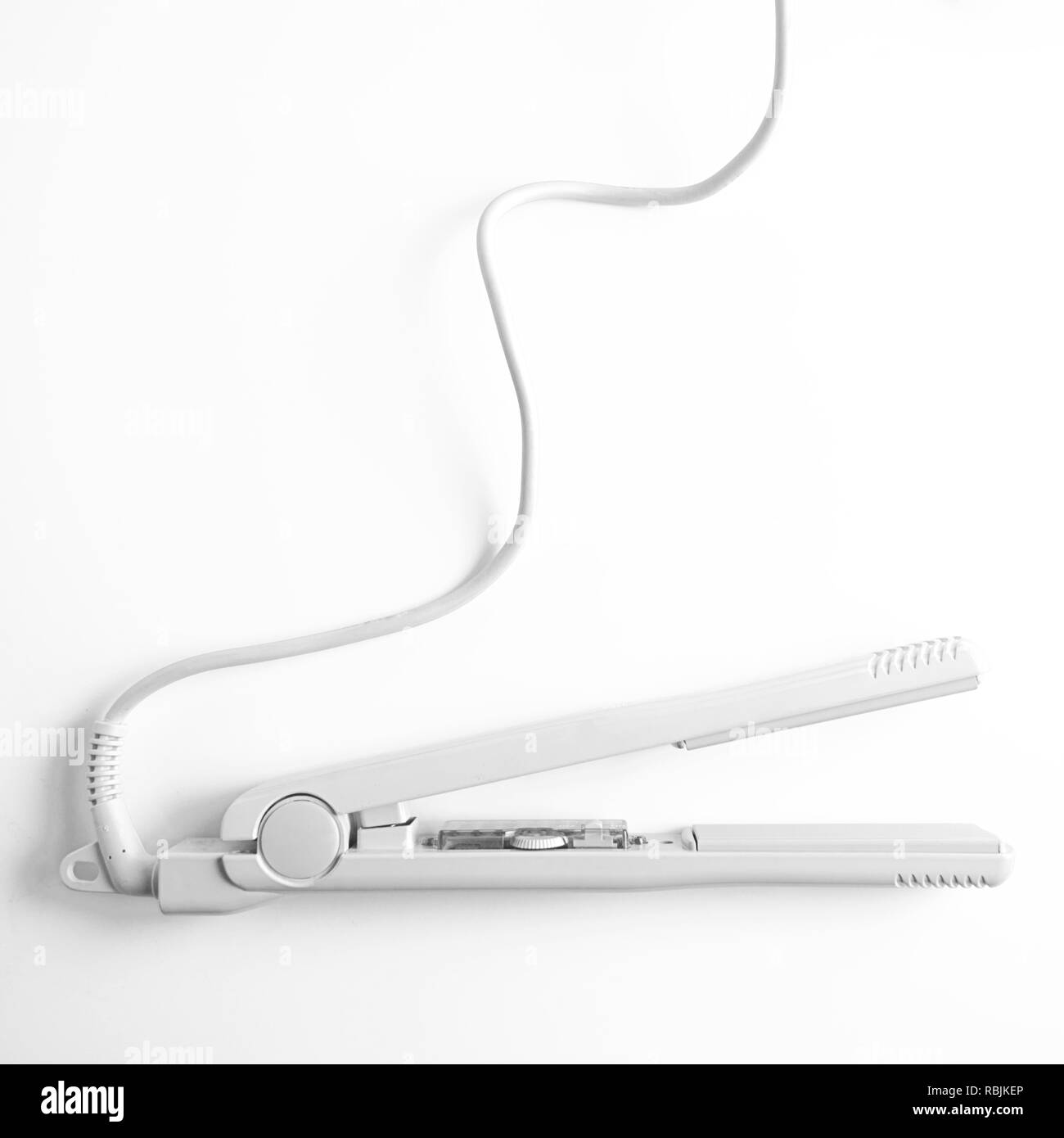 ceramic hair straightener and curling isolated on white background ...