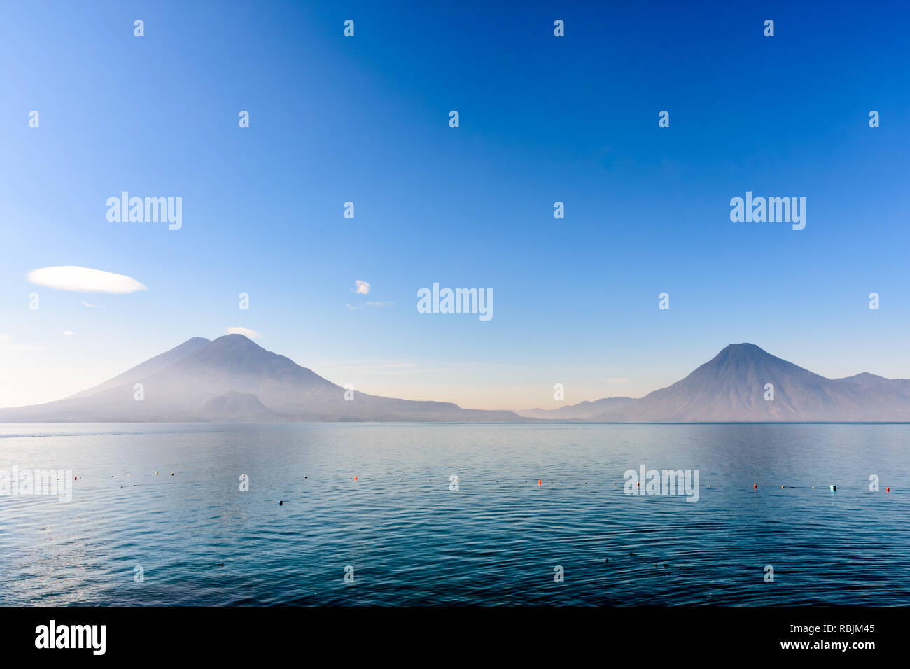 Atitlan, Toliman & San Pedro volcanoes in early morning light on Lake ...