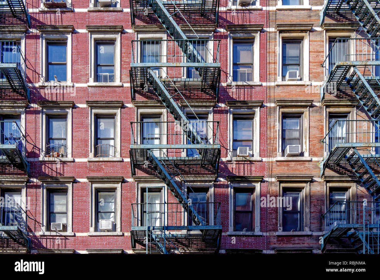 New-York building facades with fire escape stairs Stock Photo - Alamy