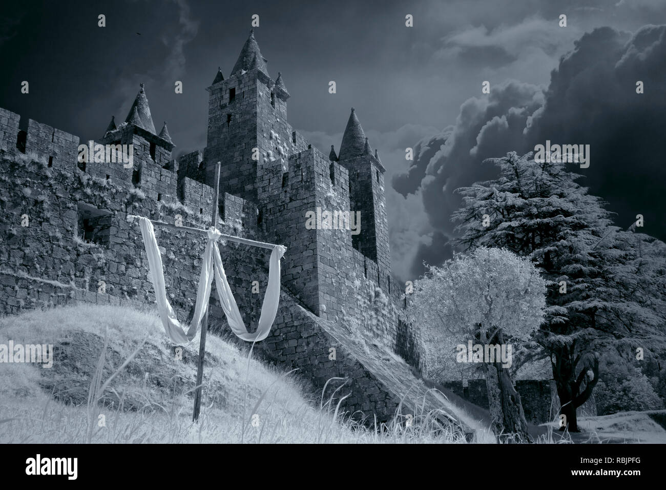 European medieval castle during lent seeing a wooden cross in the ...