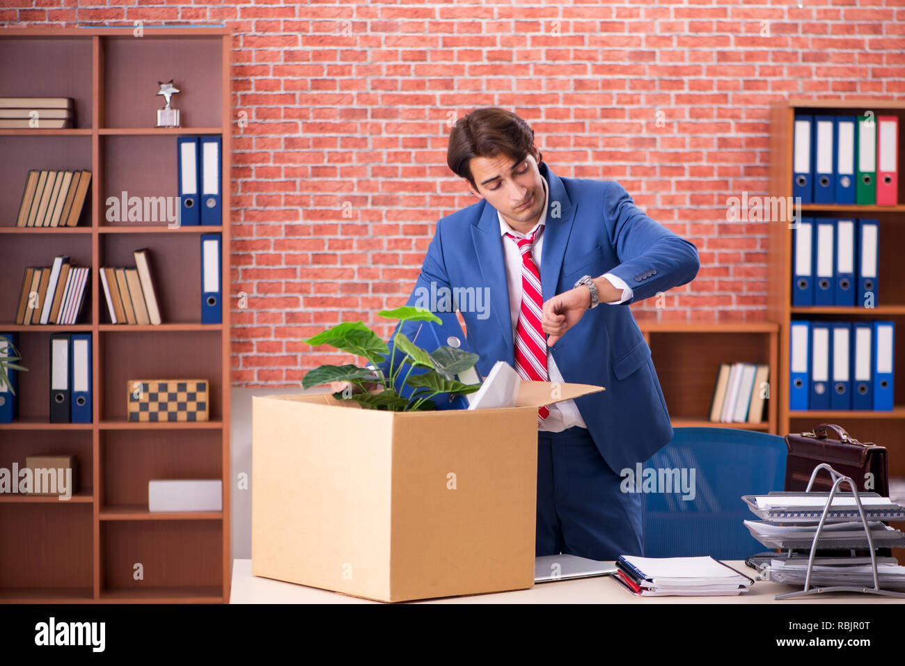 Young person being fired from his work Stock Photo - Alamy